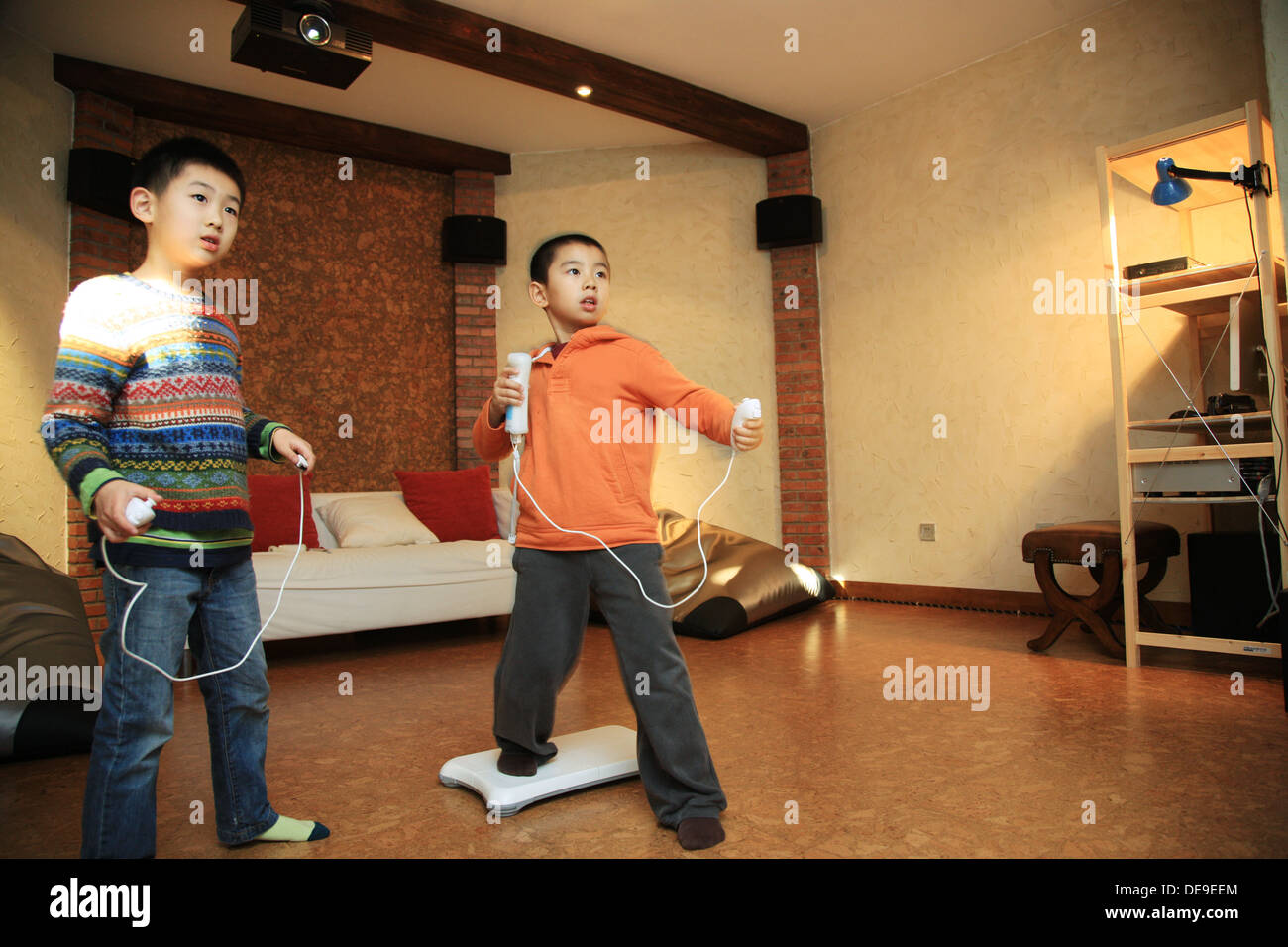 Two boys playing games Stock Photo - Alamy