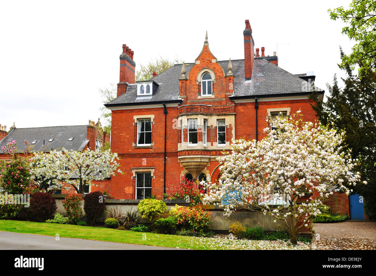 Old English red-bricked house in spring Stock Photo - Alamy