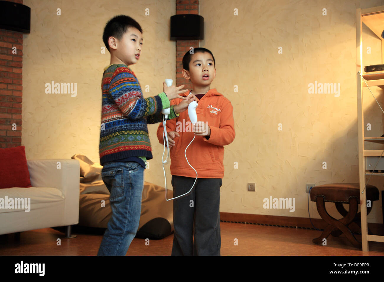Two boys playing games Stock Photo - Alamy