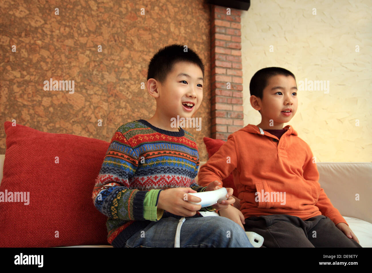 Two boys playing games Stock Photo - Alamy
