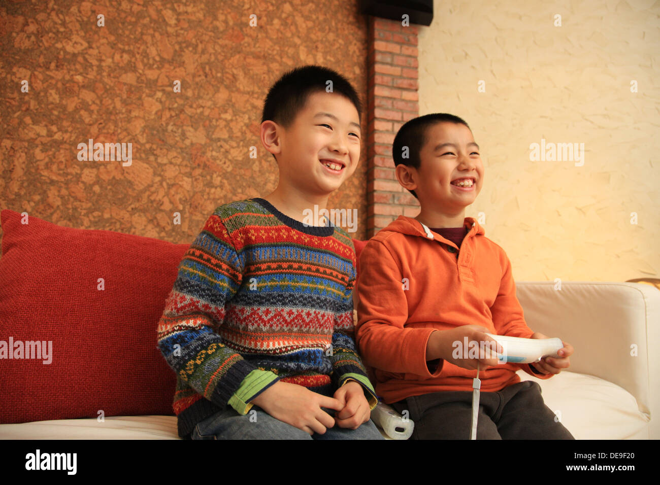 Two boys playing games Stock Photo - Alamy