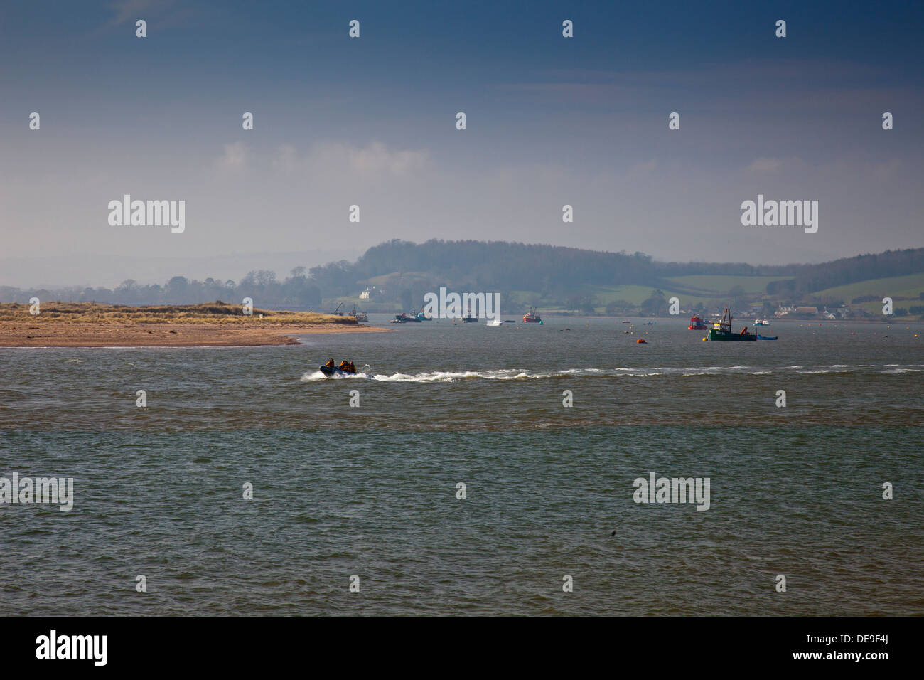 The Exmouth lifeboat crew practicing in the River Exe estuary at ...