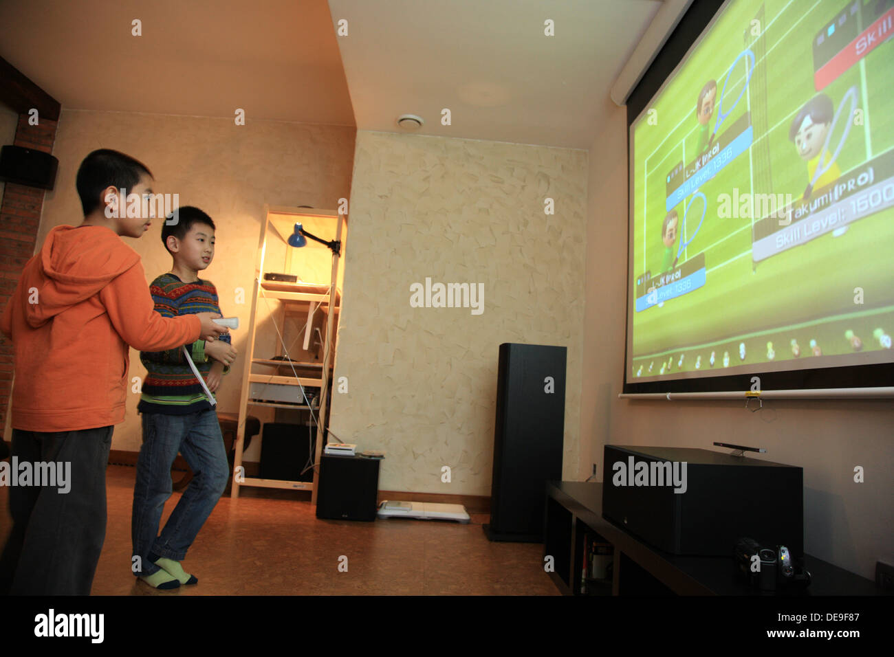 Two boys playing games Stock Photo - Alamy