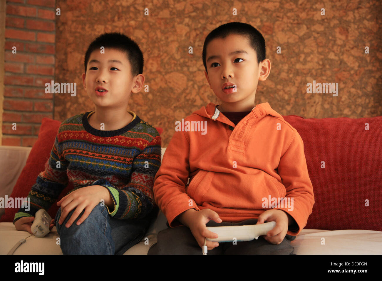 Two boys playing games Stock Photo - Alamy