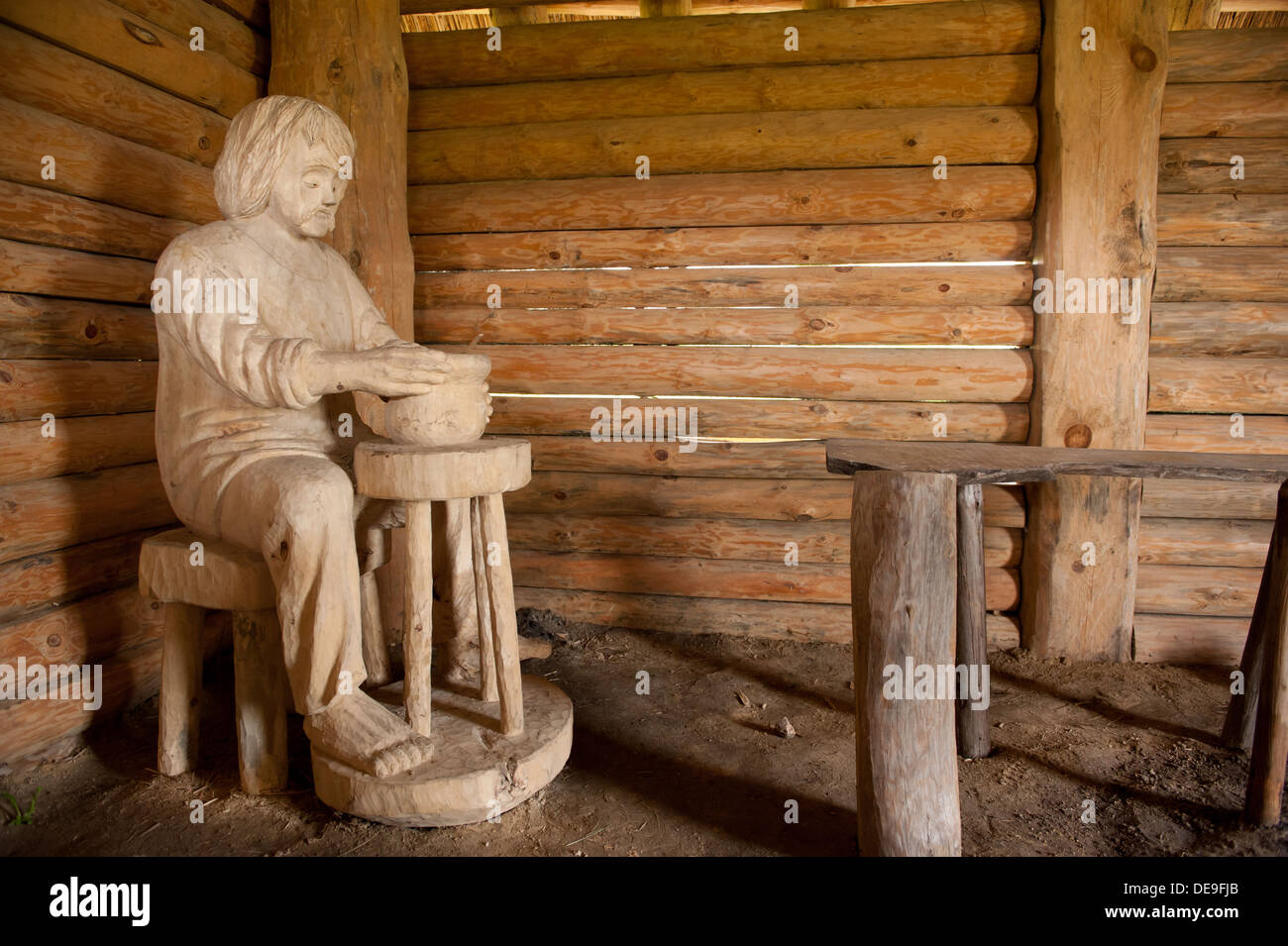 Slav worker sculpture inside hut Stock Photo - Alamy