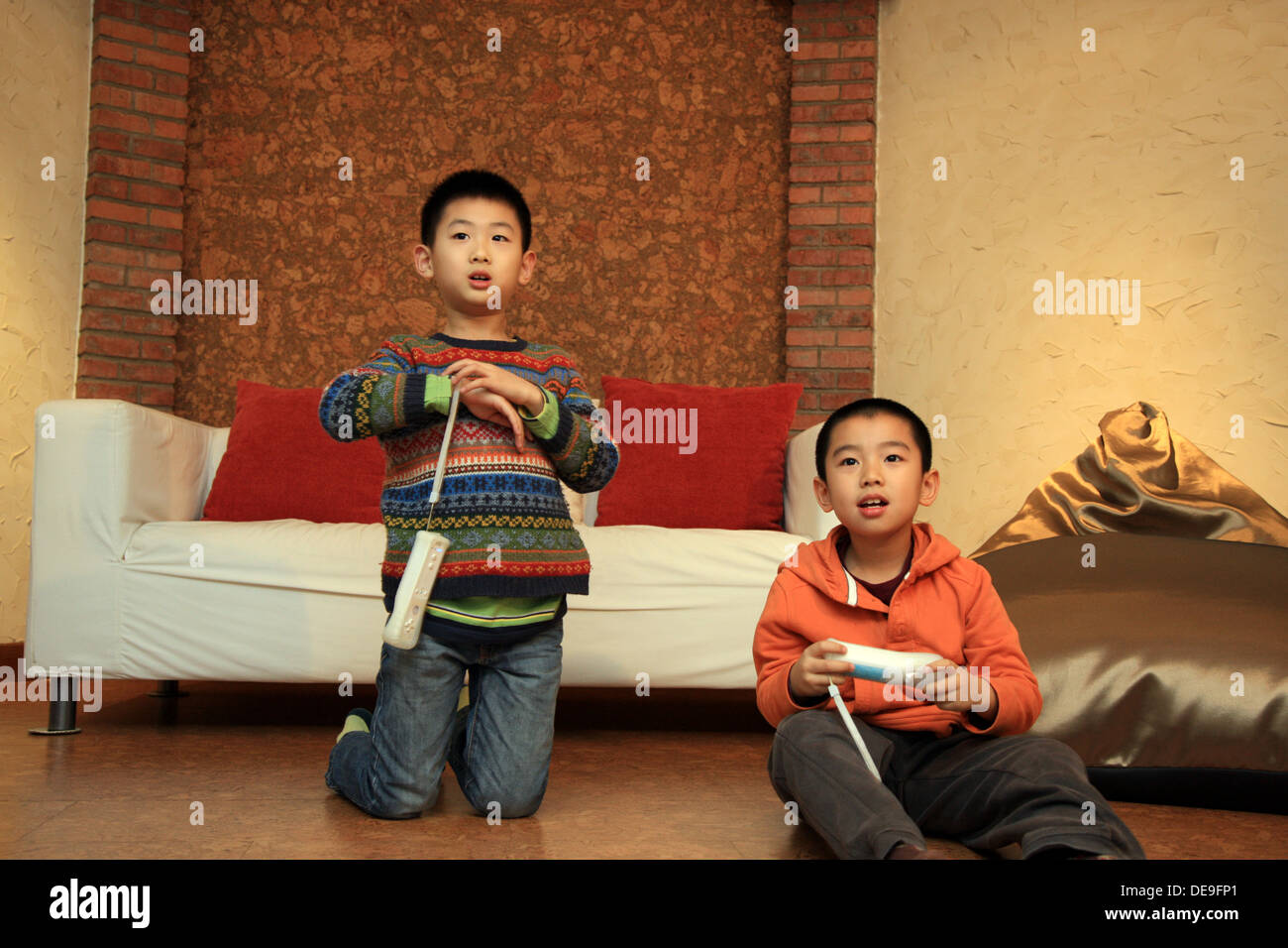 Two boys playing games Stock Photo - Alamy