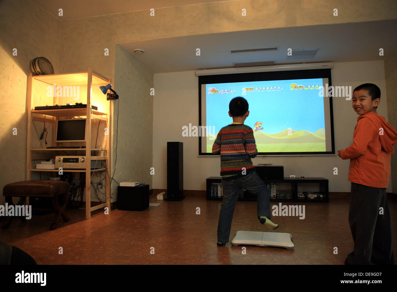 Two boys playing games Stock Photo - Alamy