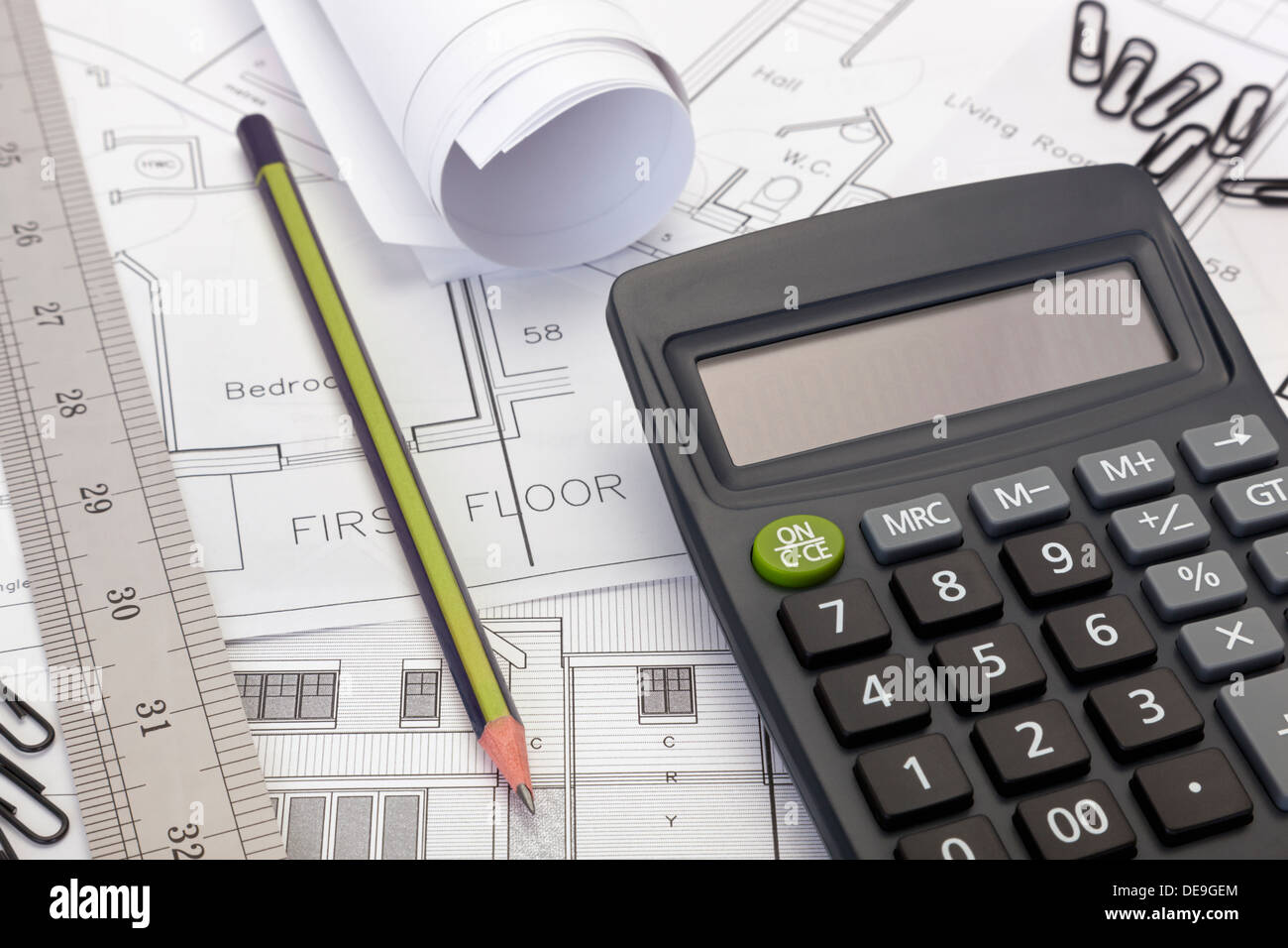 House plans with calculator for costing estimate Stock Photo - Alamy