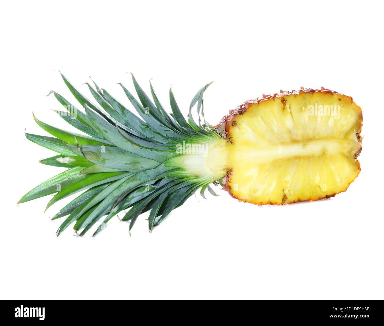 Pineapple cut in half on a white background isolated Stock Photo - Alamy