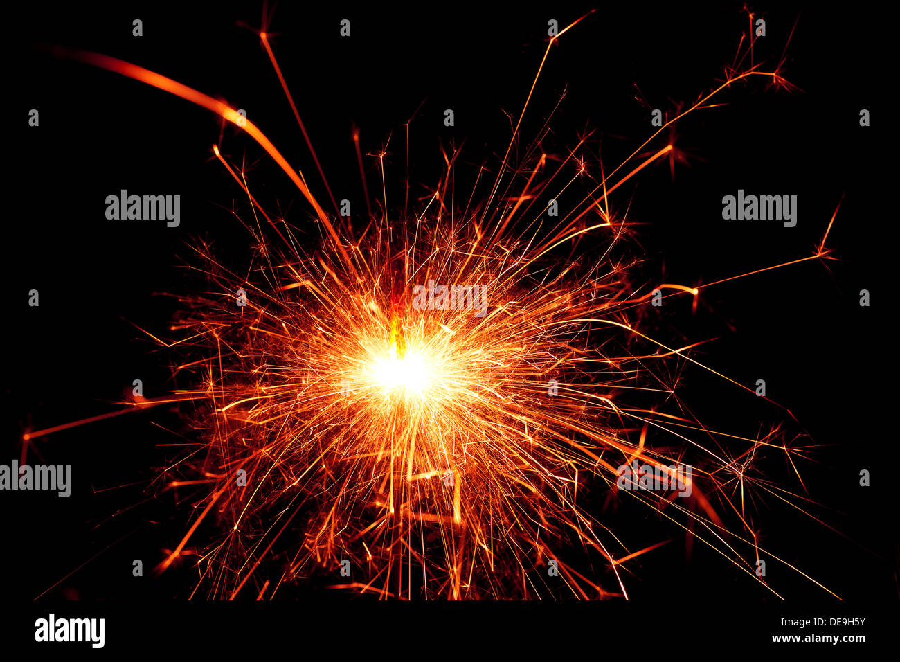 Sparklers shining bright and colourful Stock Photo - Alamy
