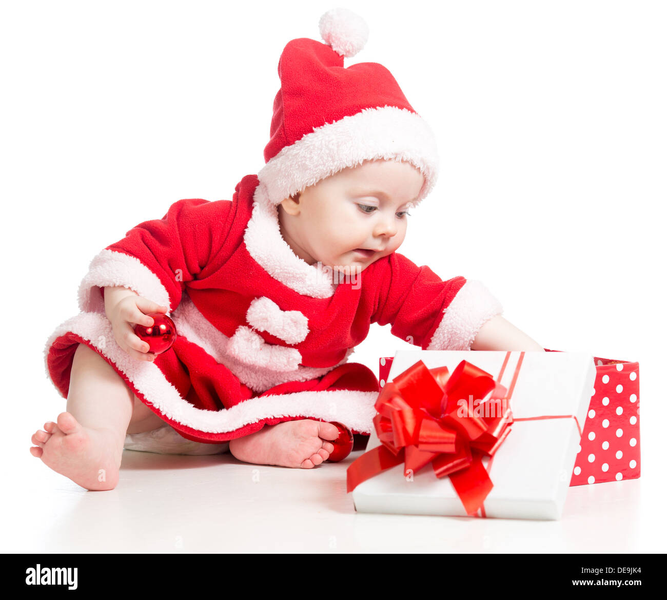 Santa Claus baby girl opening gift box isolated on white background ...