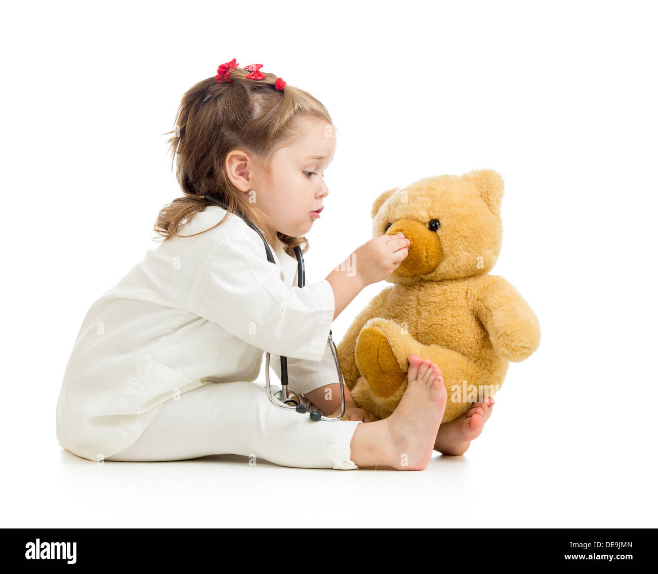 Girl child playing doctor hi-res stock photography and images - Alamy