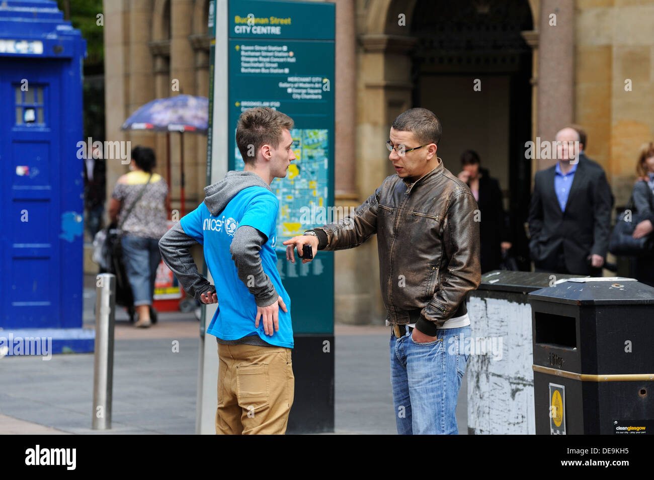Chuggers or charity muggers in Glasgow Stock Photo - Alamy