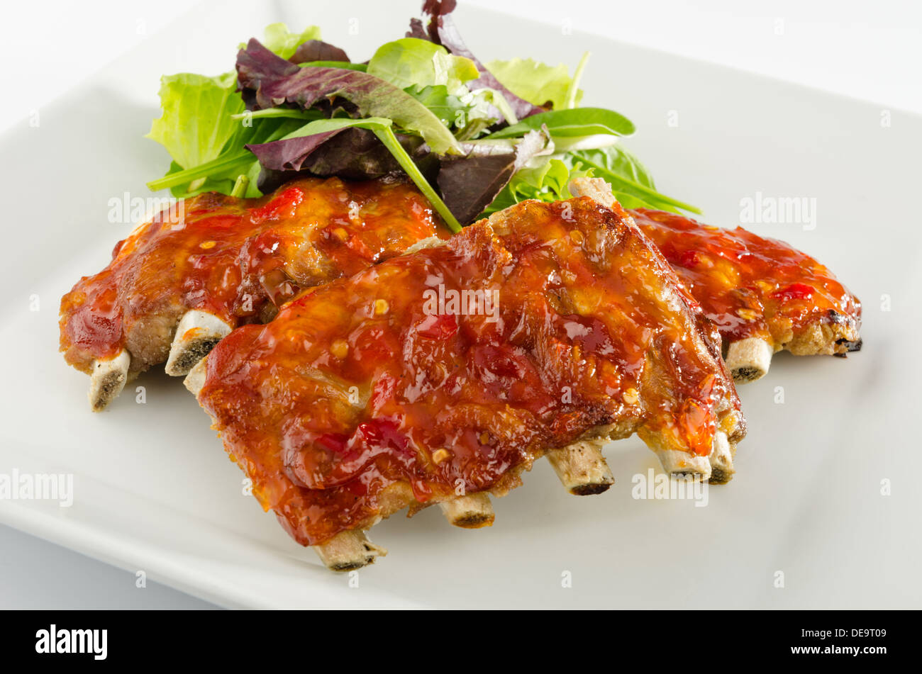 barbecue pork ribs with salad Stock Photo - Alamy