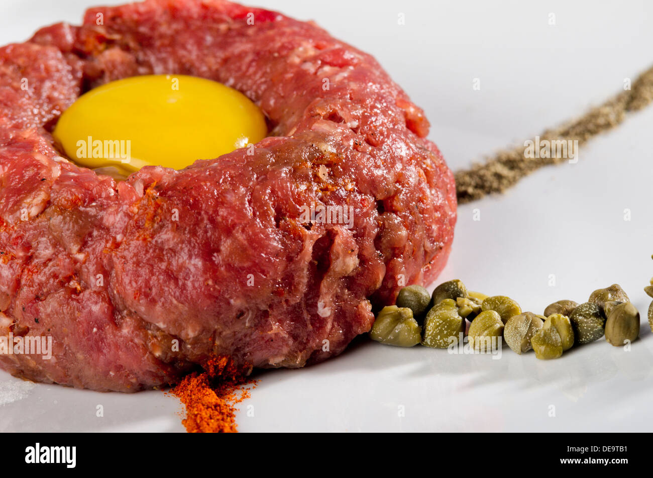 Fresh tartar with egg on a plate Stock Photo - Alamy