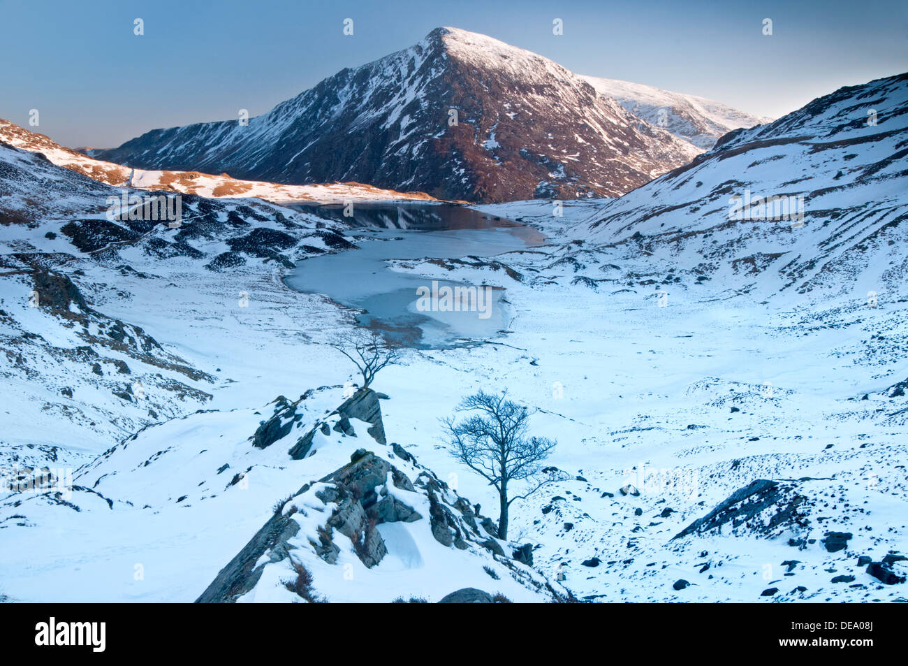 Llyn Idwal in Winter backed by Pen yr Ole Wen, Cwm Idwal, Snowdonia ...