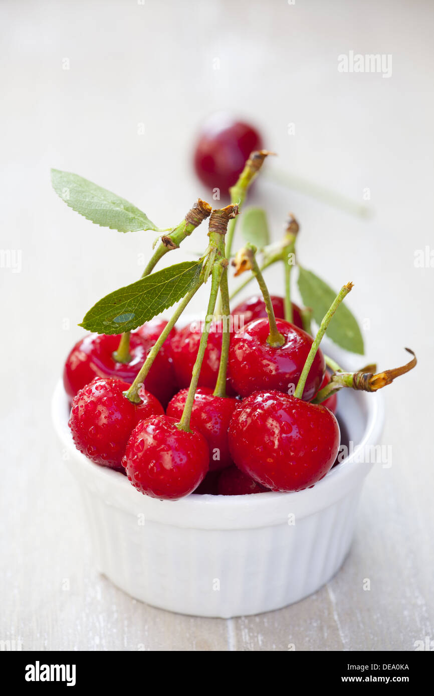 Red cherry with stalk hi-res stock photography and images - Alamy