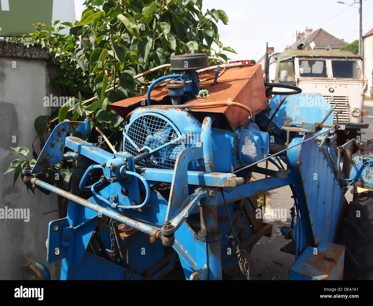 The grape-vine tractor is a specialized agricultural vehicle designed ...