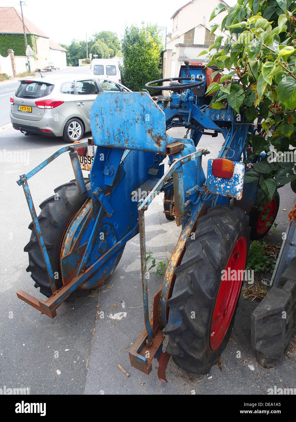 The grape-vine tractor is a specialized farming vehicle designed for ...