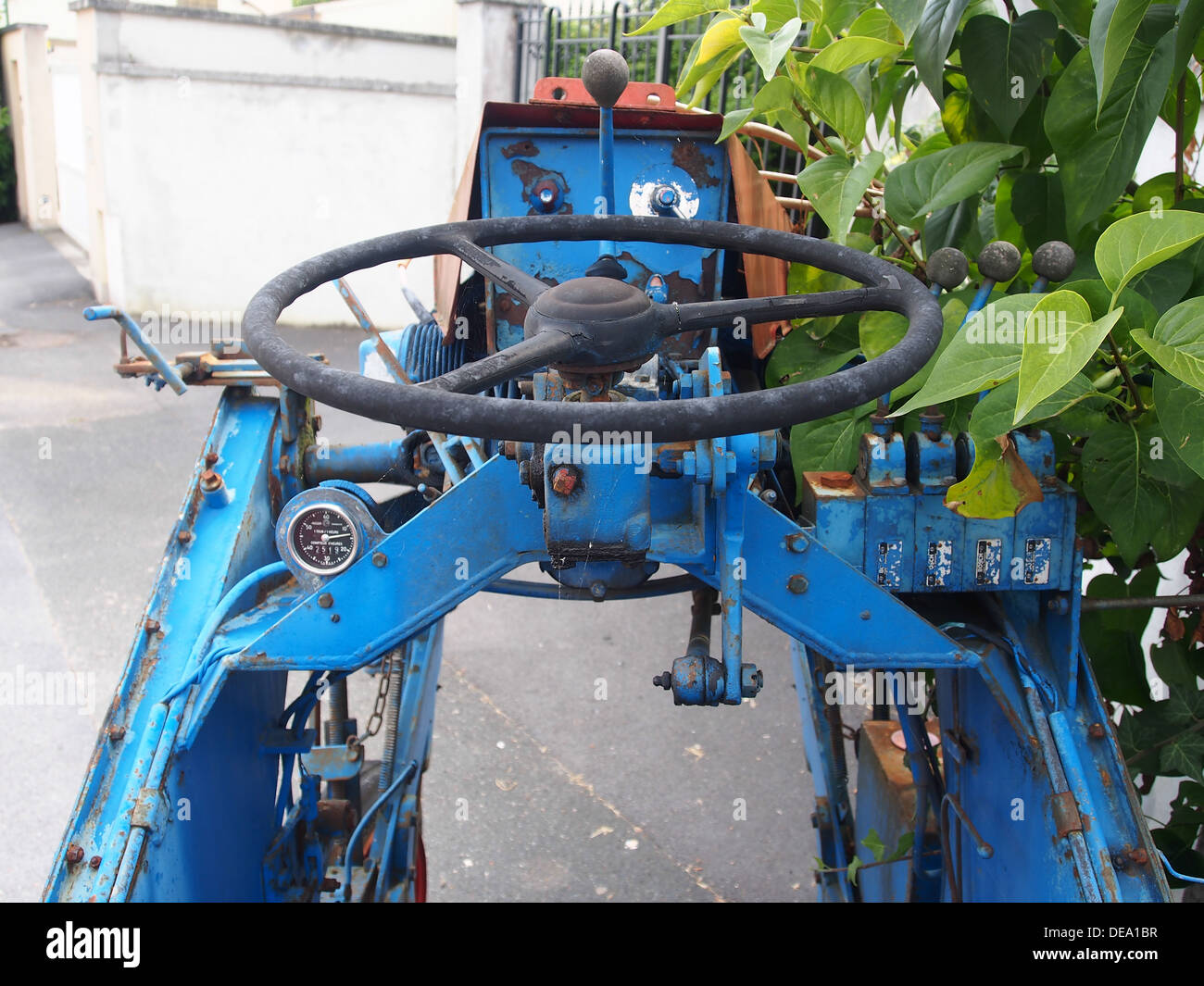 A grape-vine tractor, designed specifically for use in vineyards, is a ...