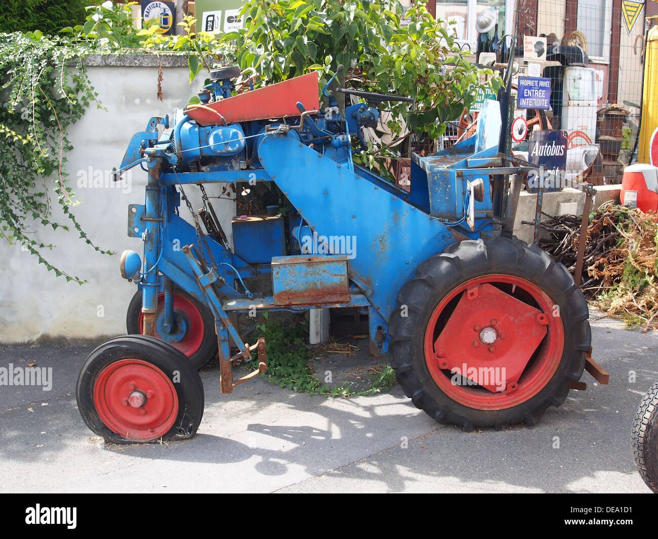 The grape-vine tractor is a specialized agricultural vehicle designed ...