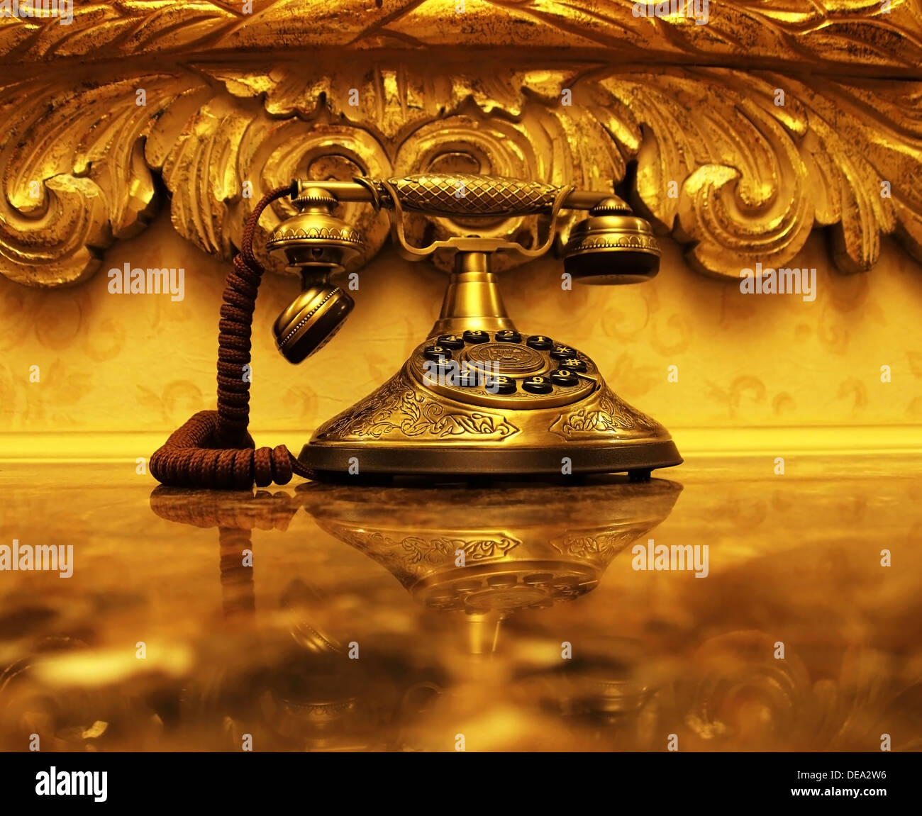 Retro telephone gold hi-res stock photography and images - Alamy