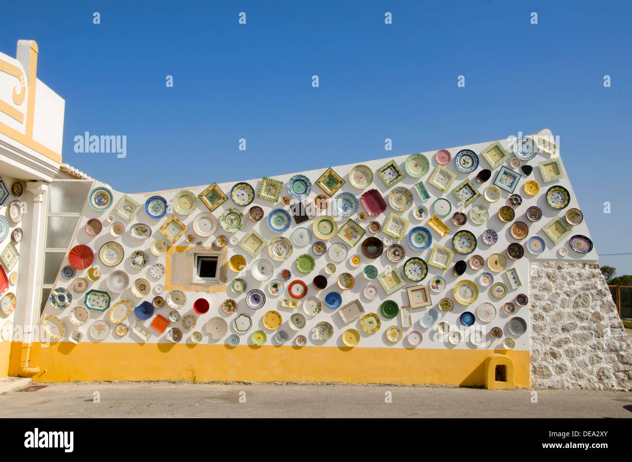 Portuguese pottery and ceramic shop with plates on wall, Cape St ...