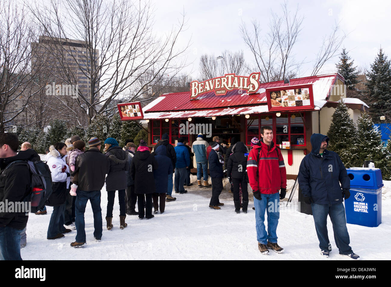 People queuing for Beaver Tails pastry stand at Winterlude festival ...