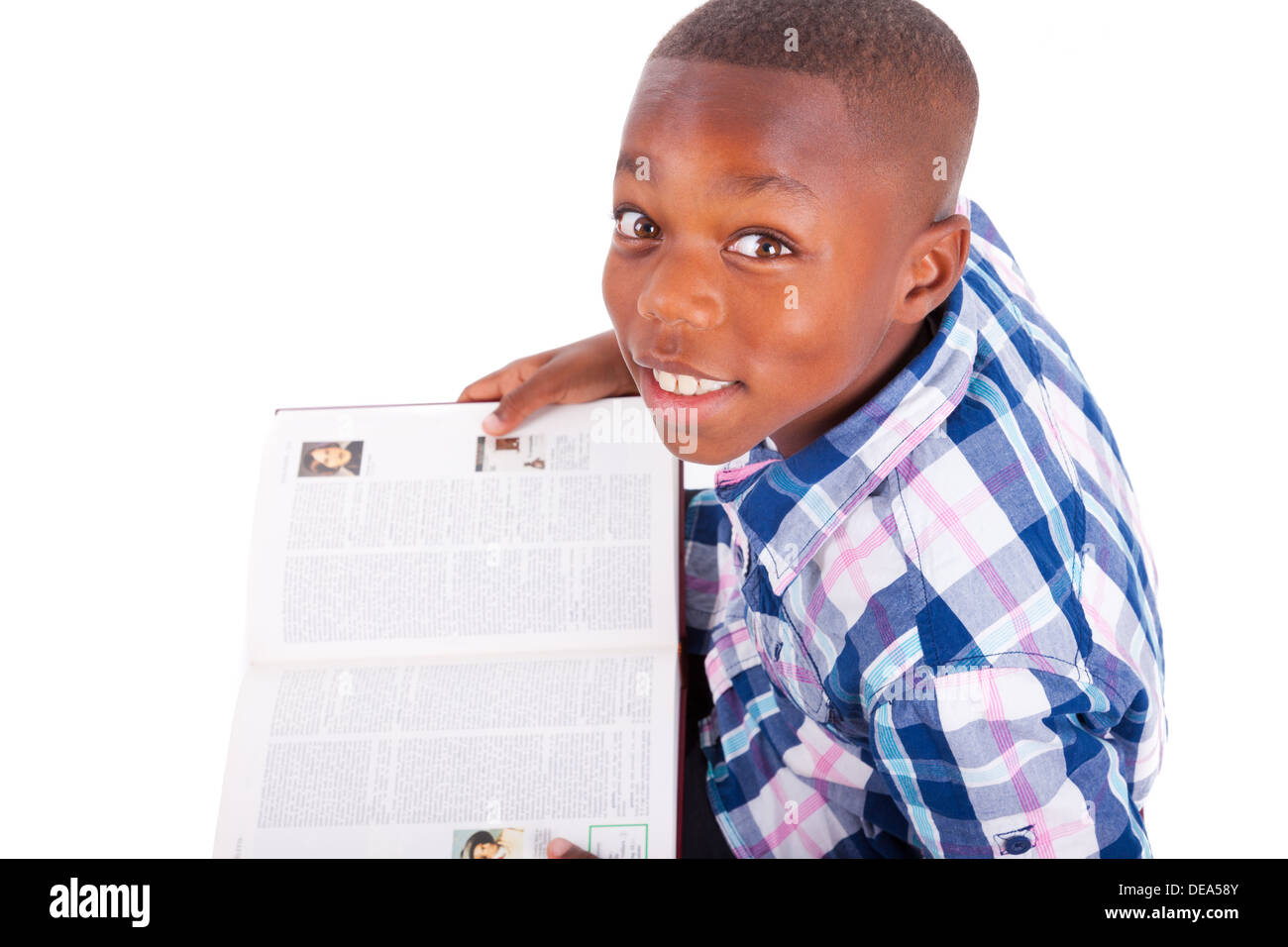 African American school boy reading a book, isolated on white ...