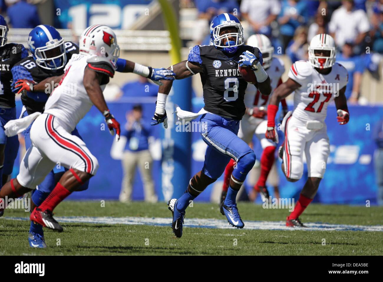 UK linebacker Josh Forrest gains some long yardage in the first quarter ...