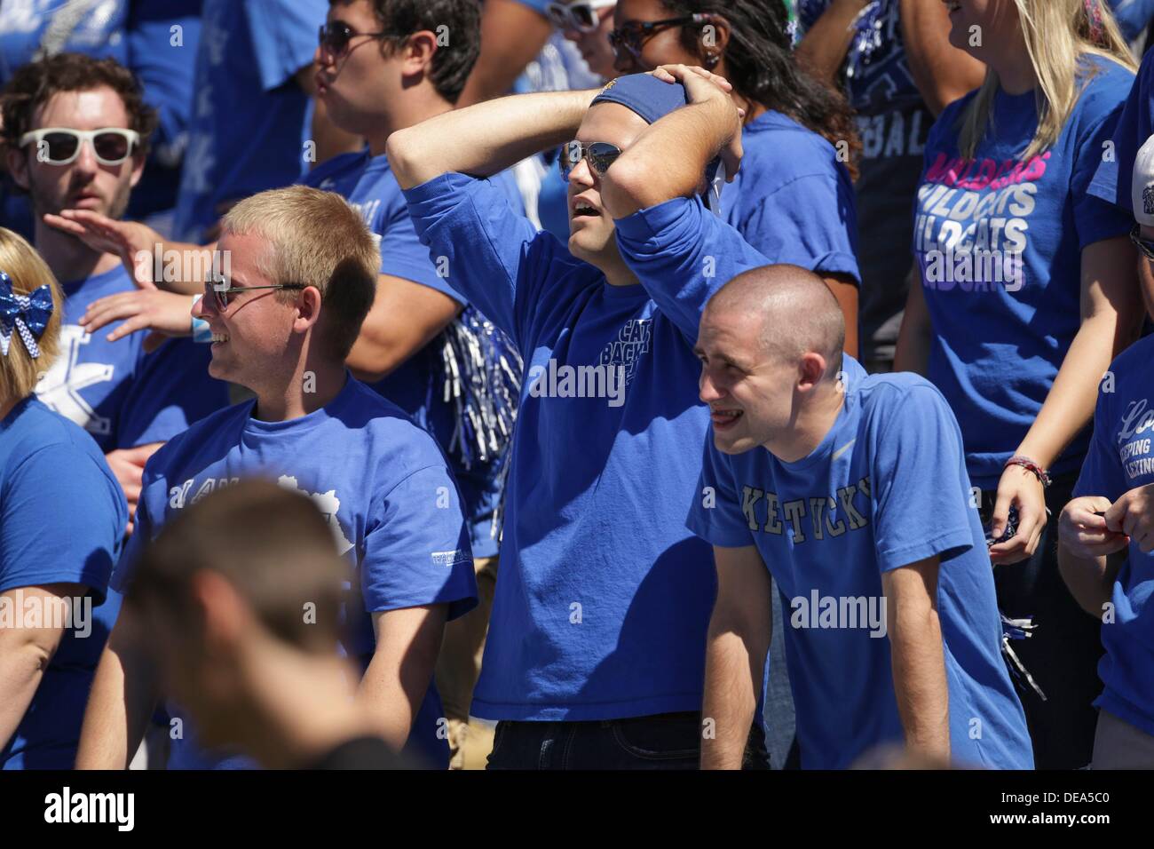 UK students Jared Hicks, left, Adam Schilt and Justin Milles reacts ...