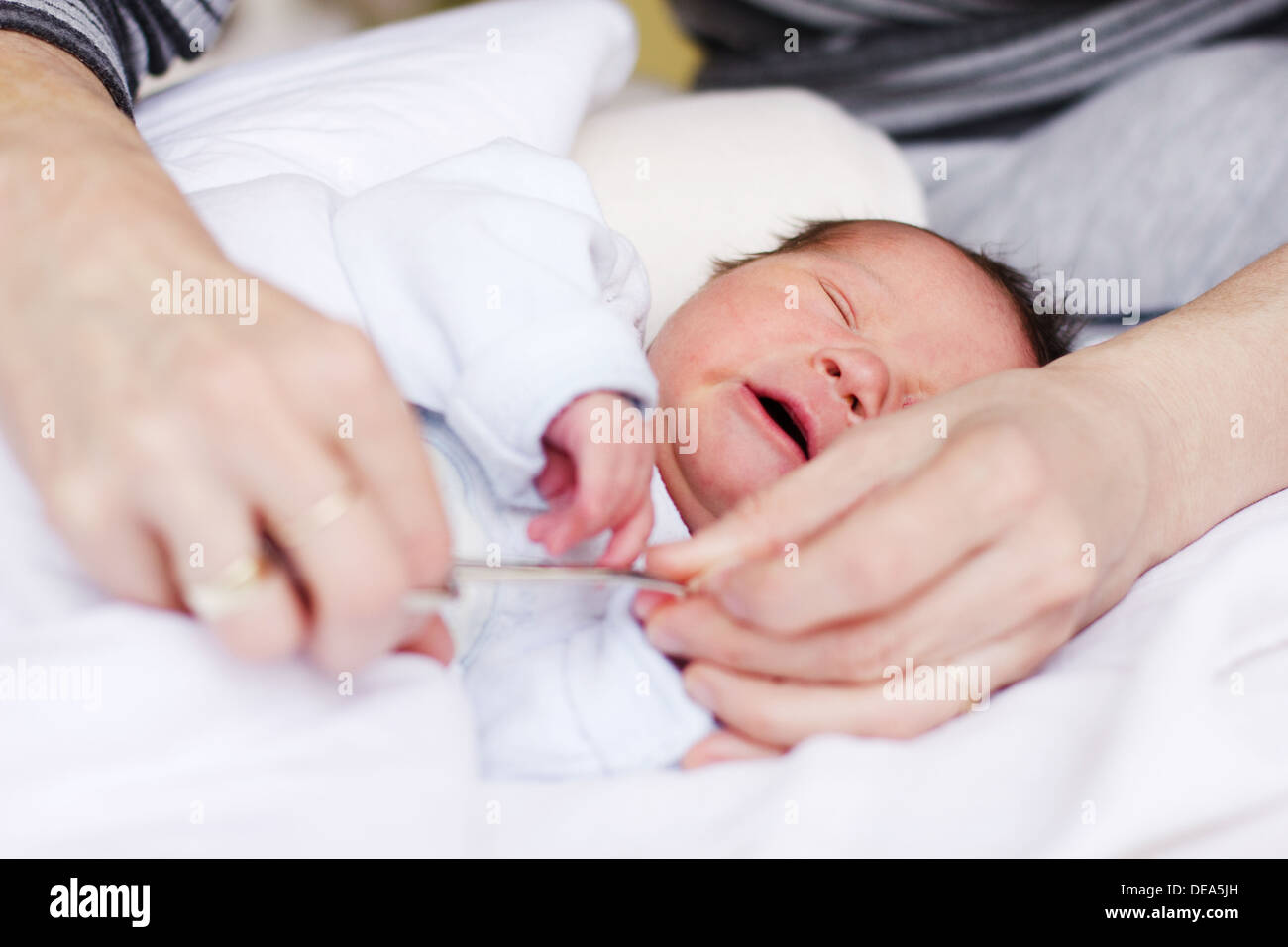 Cutting baby nails Stock Photo - Alamy