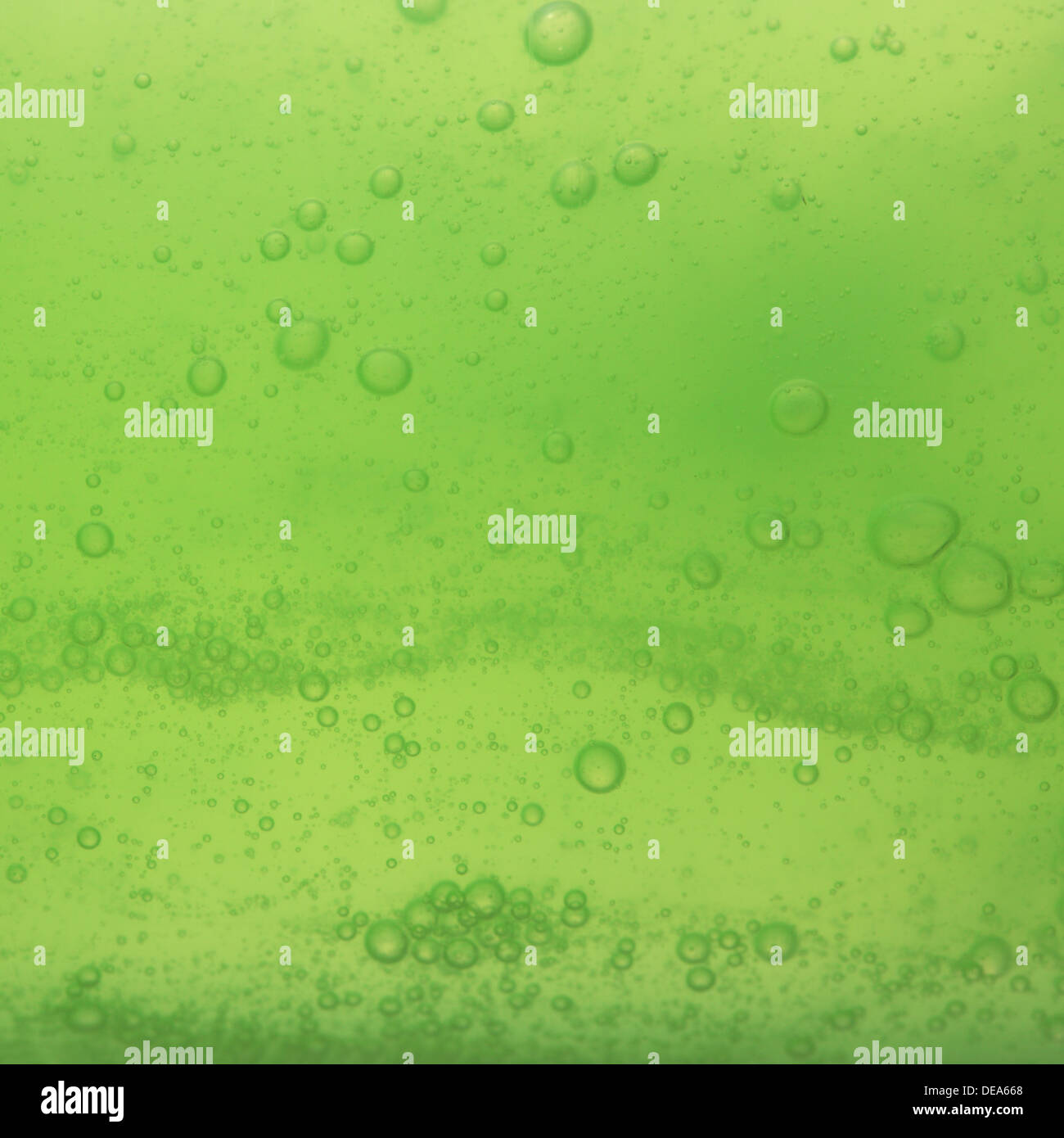 Background or texture of green liquid drop Stock Photo - Alamy