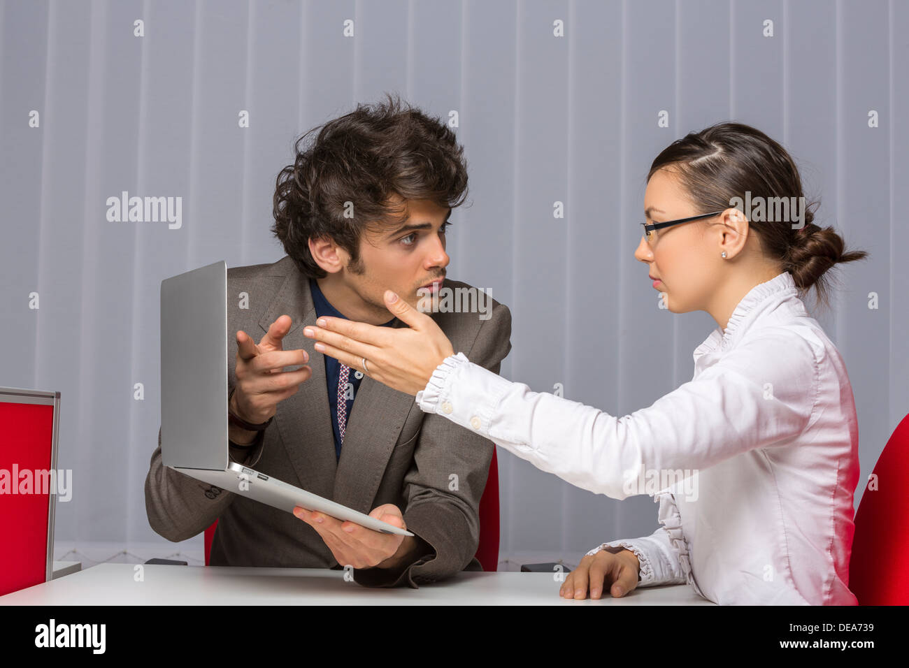 Two people arguing pointing hi-res stock photography and images - Alamy