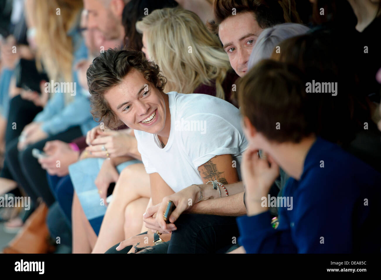Harry Styles in the front row during the House of Holland collection ...