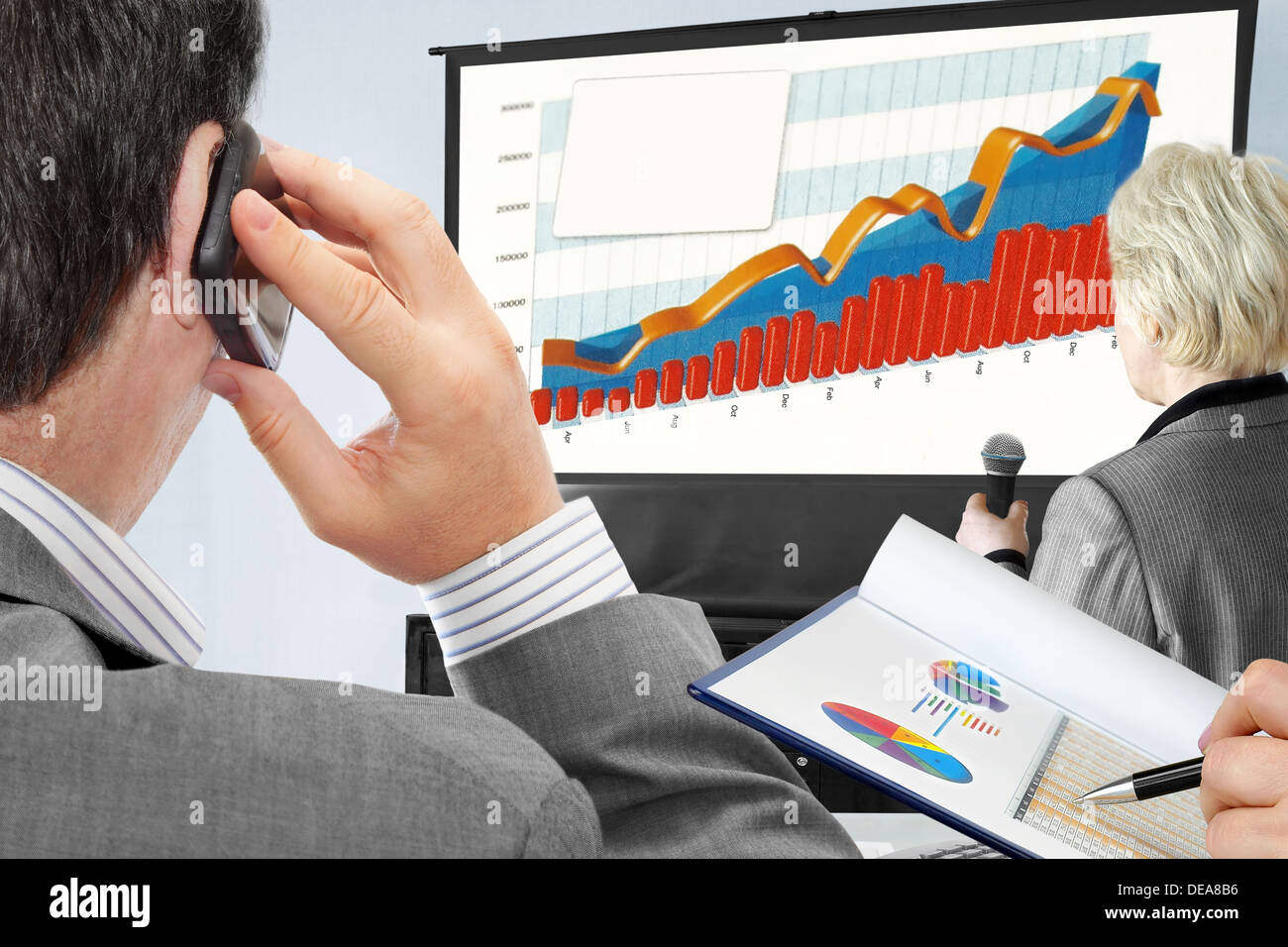 Discussing financial chart business team hi-res stock photography and ...