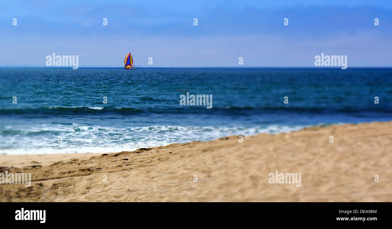 Beach sailboat traveling horizon over hi-res stock photography and ...