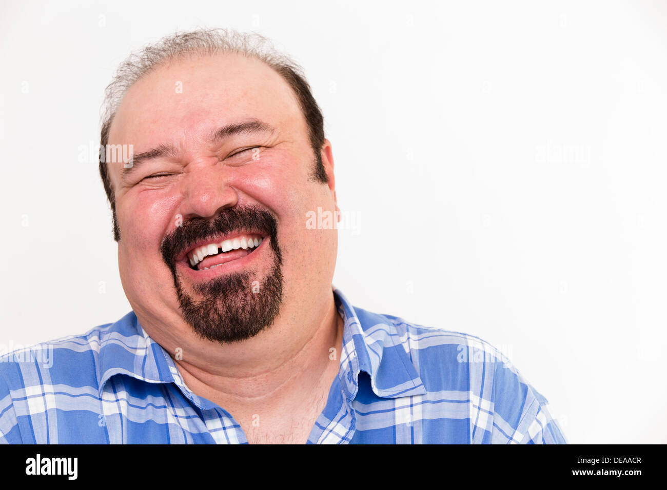 Close-up horizontal portrait of a cheerful middle-aged Caucasian man ...