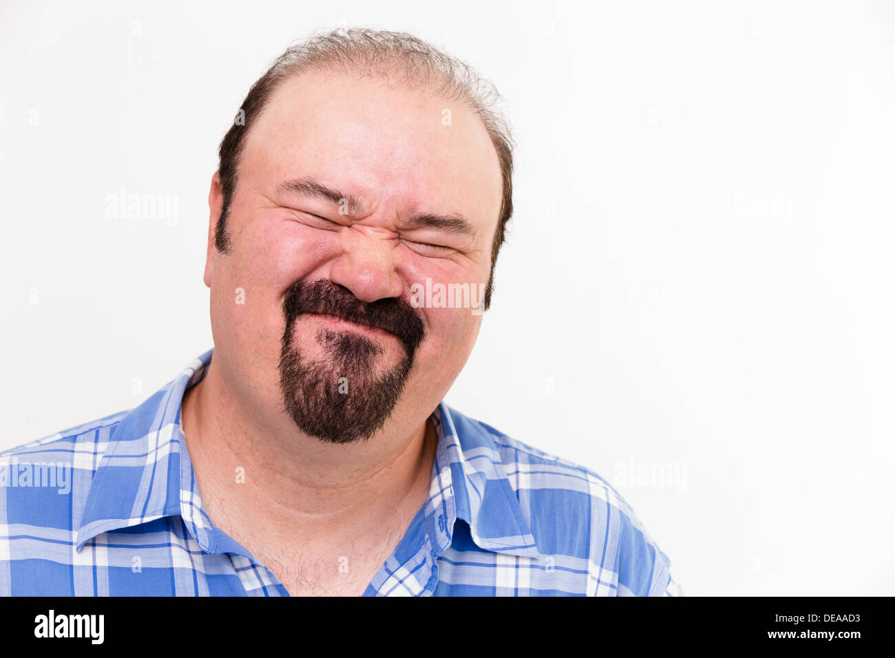 Regretful expressive face on a man isolated on white Stock Photo - Alamy