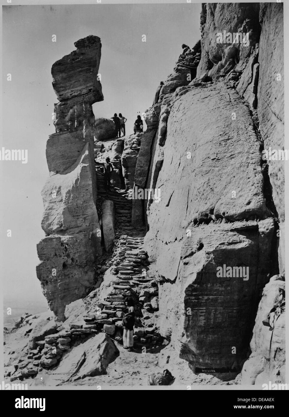 This photograph shows a trail at Walpi, a traditional Hopi village on ...
