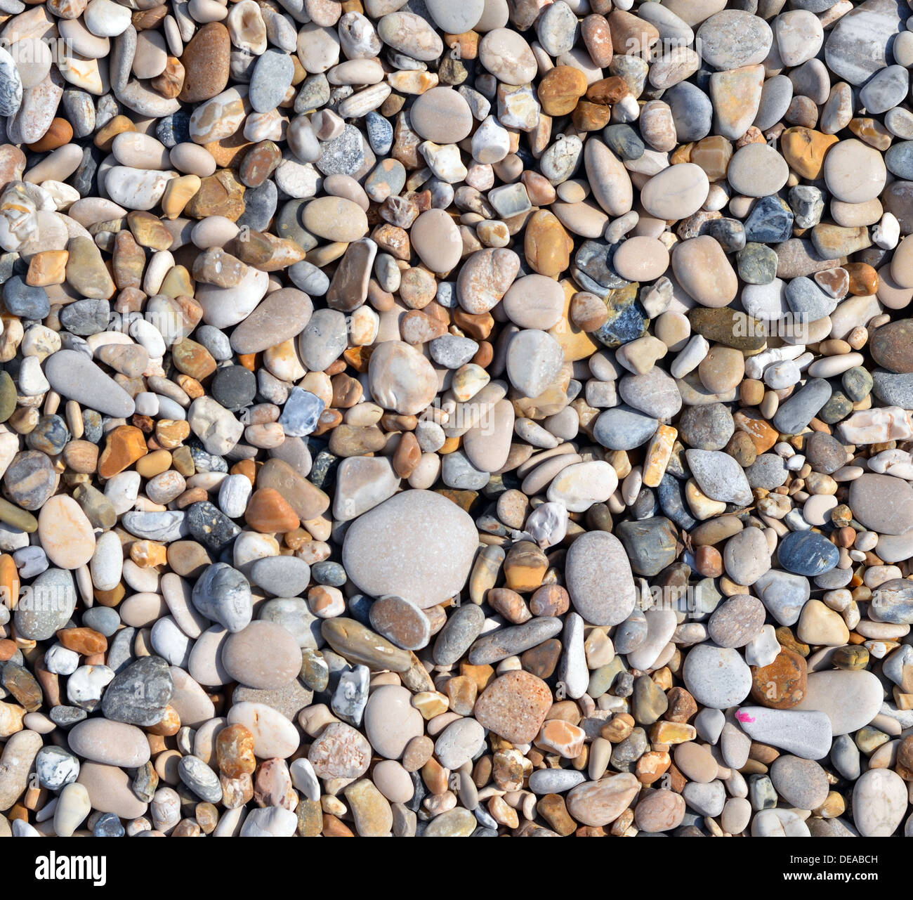 Beach stone background Stock Photo - Alamy