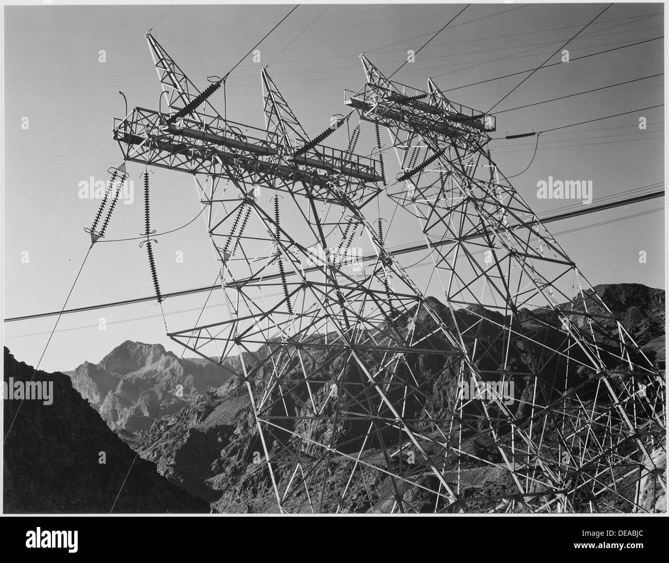 This close-up photograph from 1941 shows the transmission lines of ...