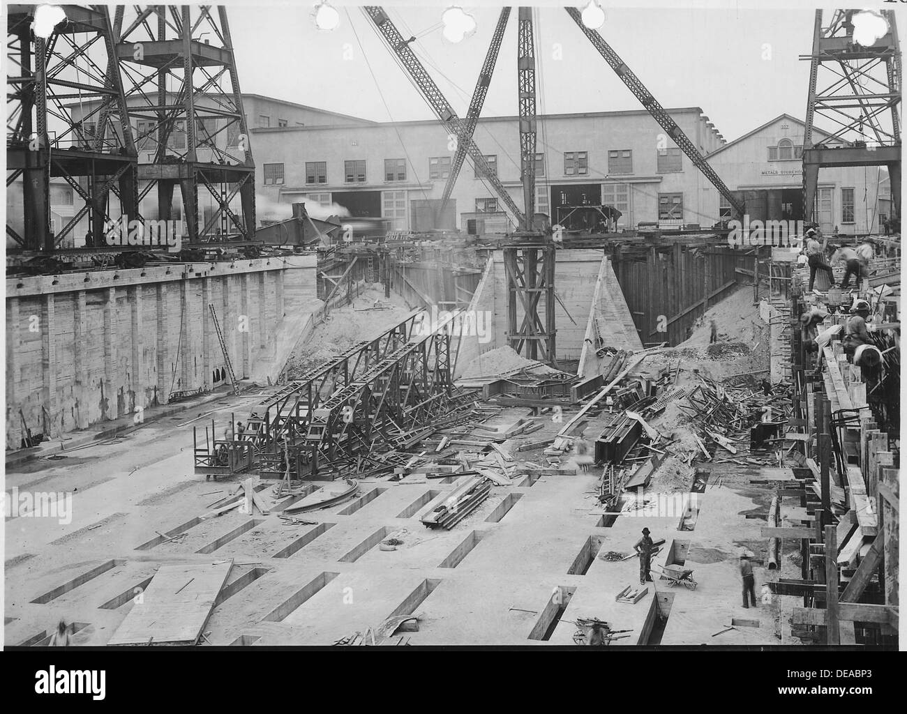 This photograph shows the construction of a shipbuilding dock, viewed ...