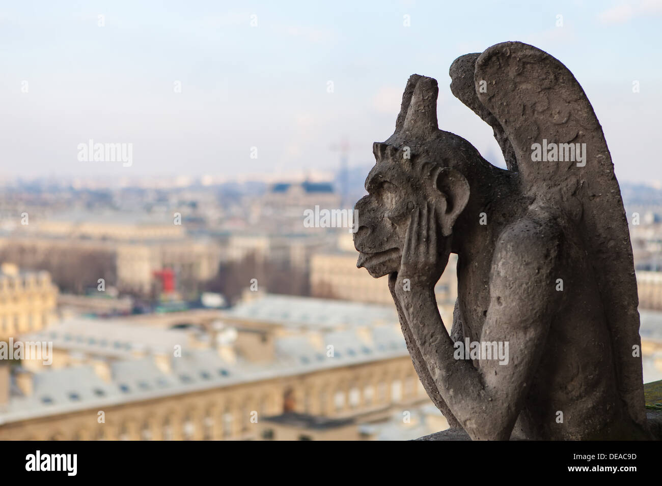 Notre Dame of Paris: Famous Chimera (demon) overlooking the Eiffel ...