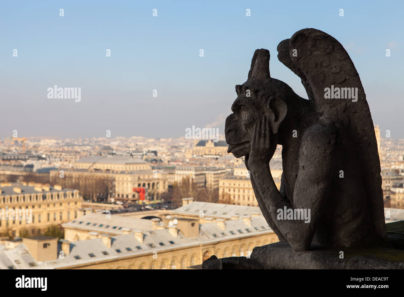 Notre Dame of Paris: Famous Chimera (demon) overlooking the Eiffel ...