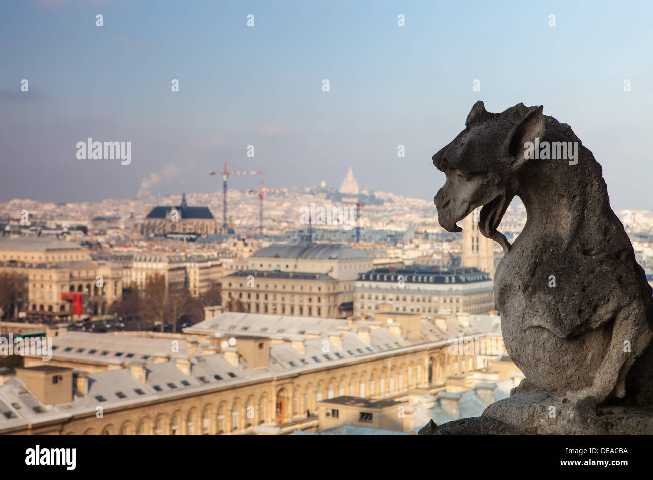 Notre Dame of Paris: Famous Chimera (demon) overlooking the Eiffel ...
