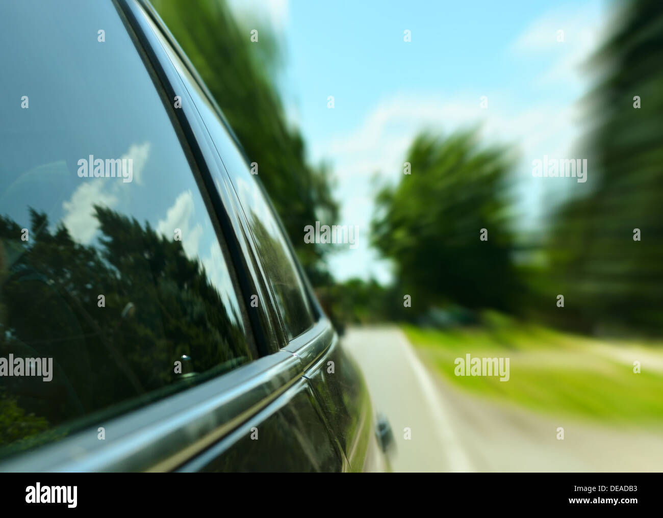 Car driving through forest at speed hi-res stock photography and images ...