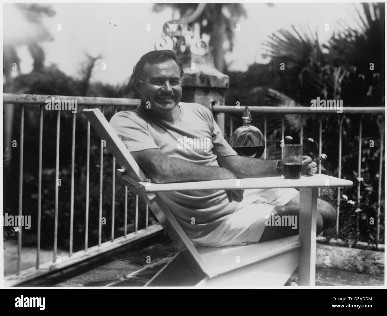 This photograph shows Ernest Hemingway at the Finca Vigia in Cuba in ...