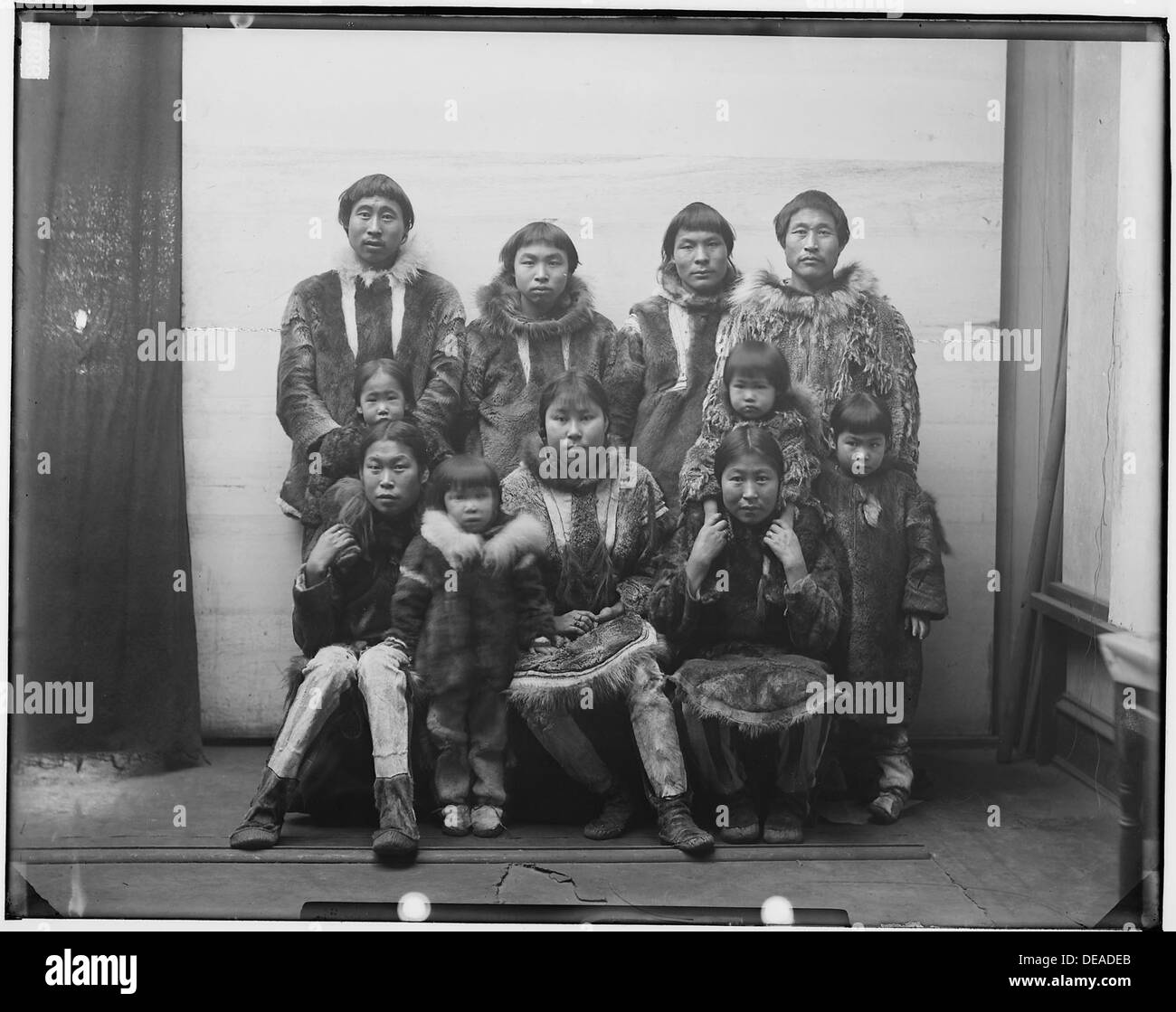 A group of Eskimos, likely referring to the Inuit or other Indigenous ...
