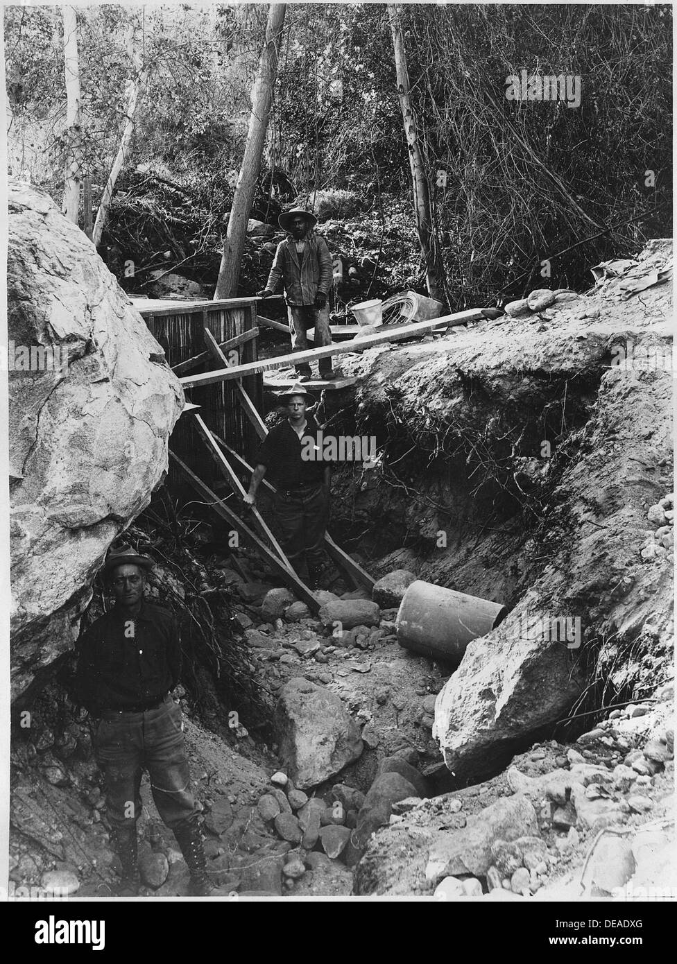 The image depicts a trench for a pipe leading from the Andreas Canyon ...
